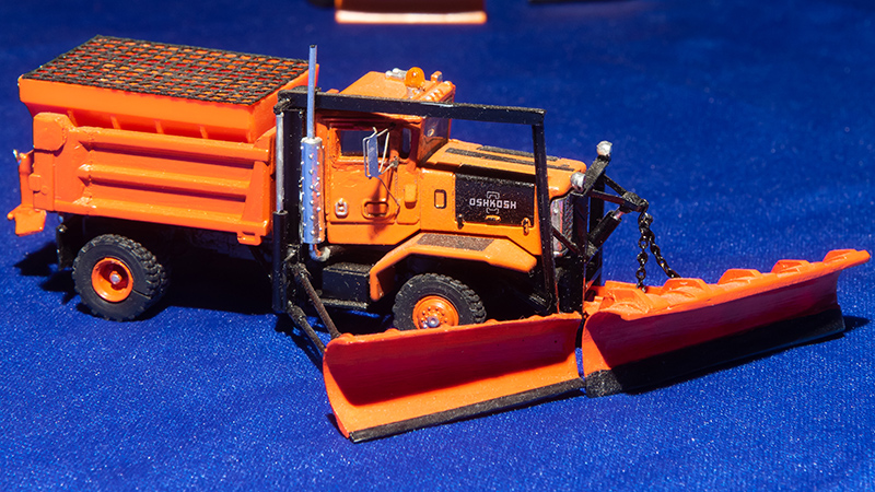 Oshkosh Snow Plow & Salt Spreader - By David Copeland