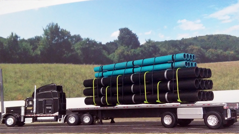 Peterbilt 379 Truck Tractor & Flatbed Trailer With Pipe Load